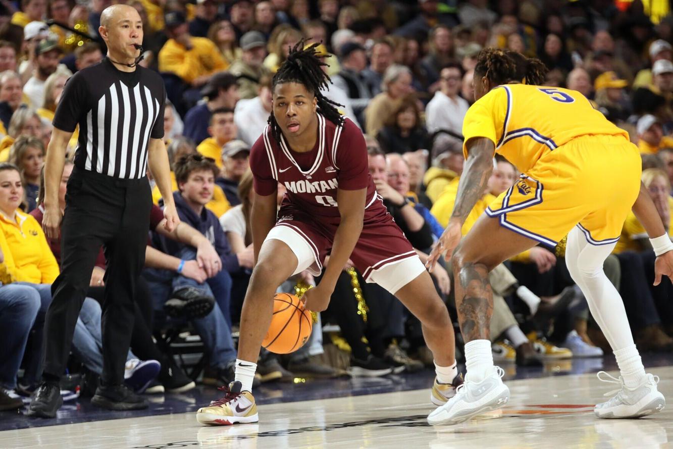 Montana Grizzlies hold off Montana State Bobcats to give Travis DeCuire ...