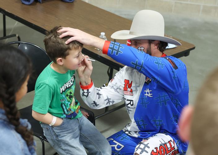 Pro bull riders and Flint Rasmussen host junior clown clinic at Metra