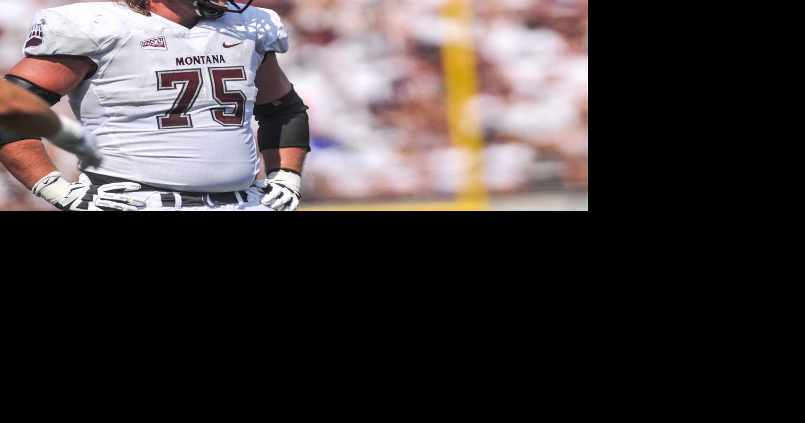 Armed with his famed mullet, senior offensive lineman Robert Luke back ...