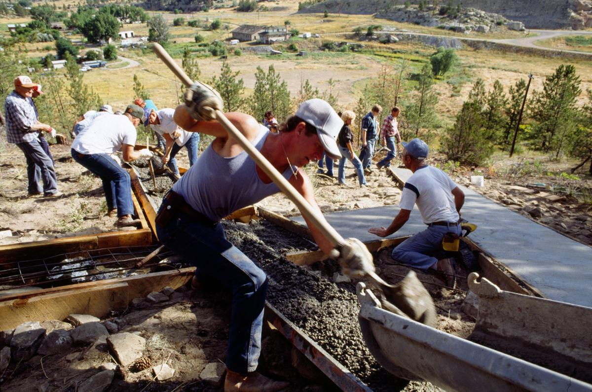 Hillside letters, symbols of town and school pride, are stamped on the ...