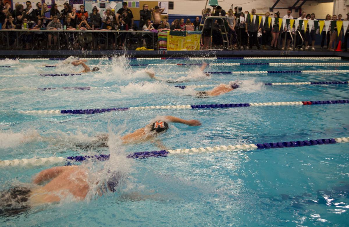 Multiple records fall on the first day of State Swimming