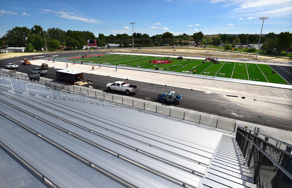 Photos: Crews finishing up turf on Lockwood Lions football field