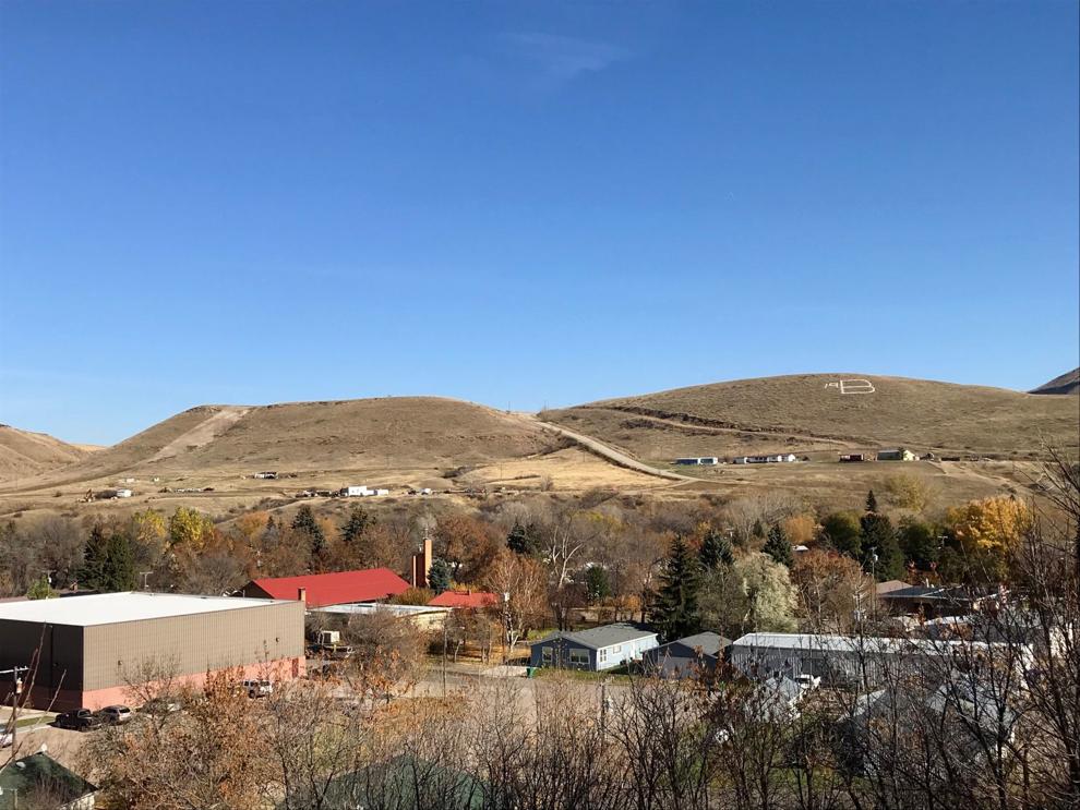 Photos of Montana's hillside letters