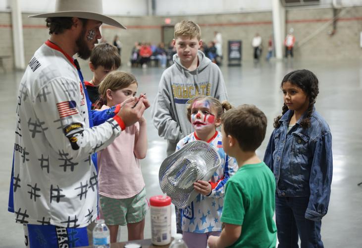Pro bull riders and Flint Rasmussen host junior clown clinic at Metra