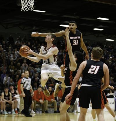 Manhattan Christian all-state hoops star Seth Amunrud signs with Dawson CC