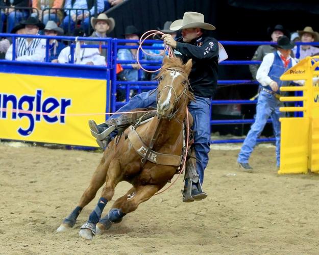National Finals Rodeo: Billings team roper Clay Tryan and partner Jake ...