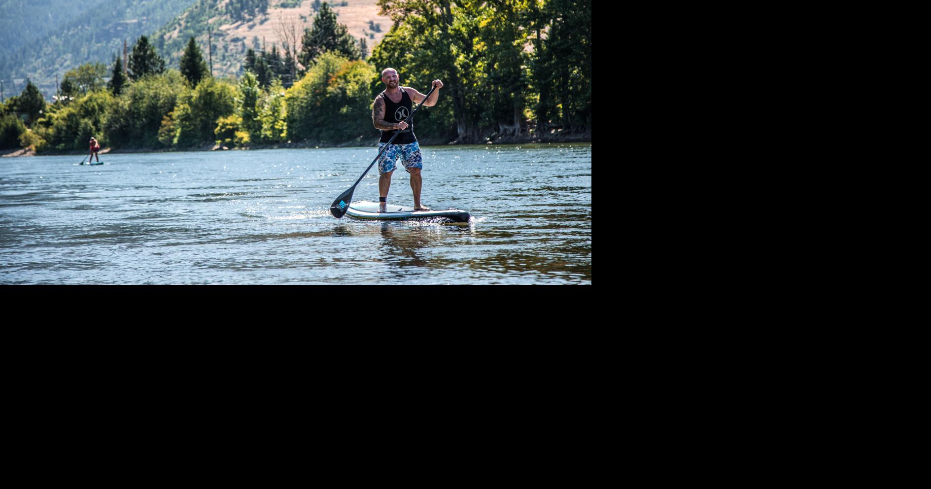 SUP Cup spill: Stand-up paddle boarders brave wave, win race