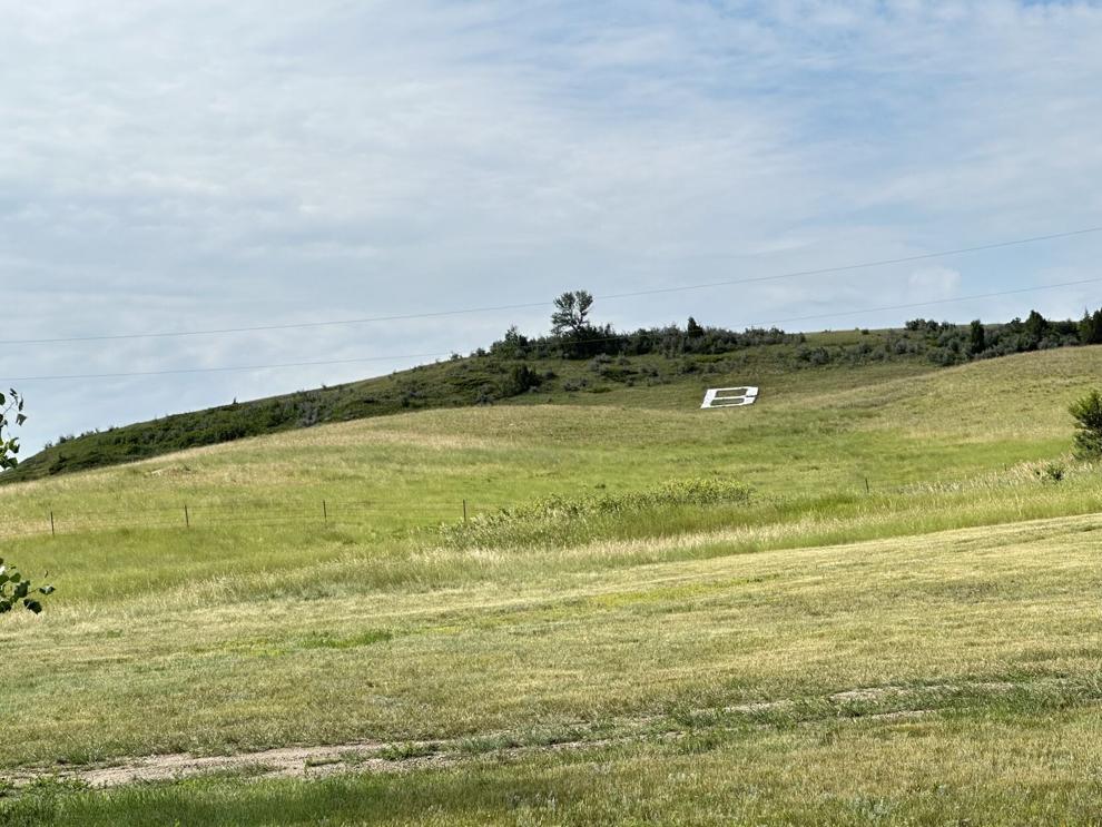 Photos of Montana's hillside letters