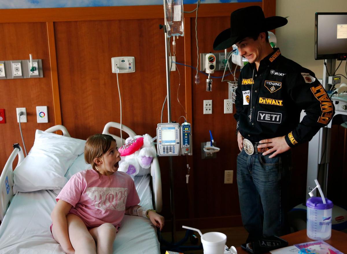 PBR world champion Jess Lockwood takes a moment to brighten girl's day ...