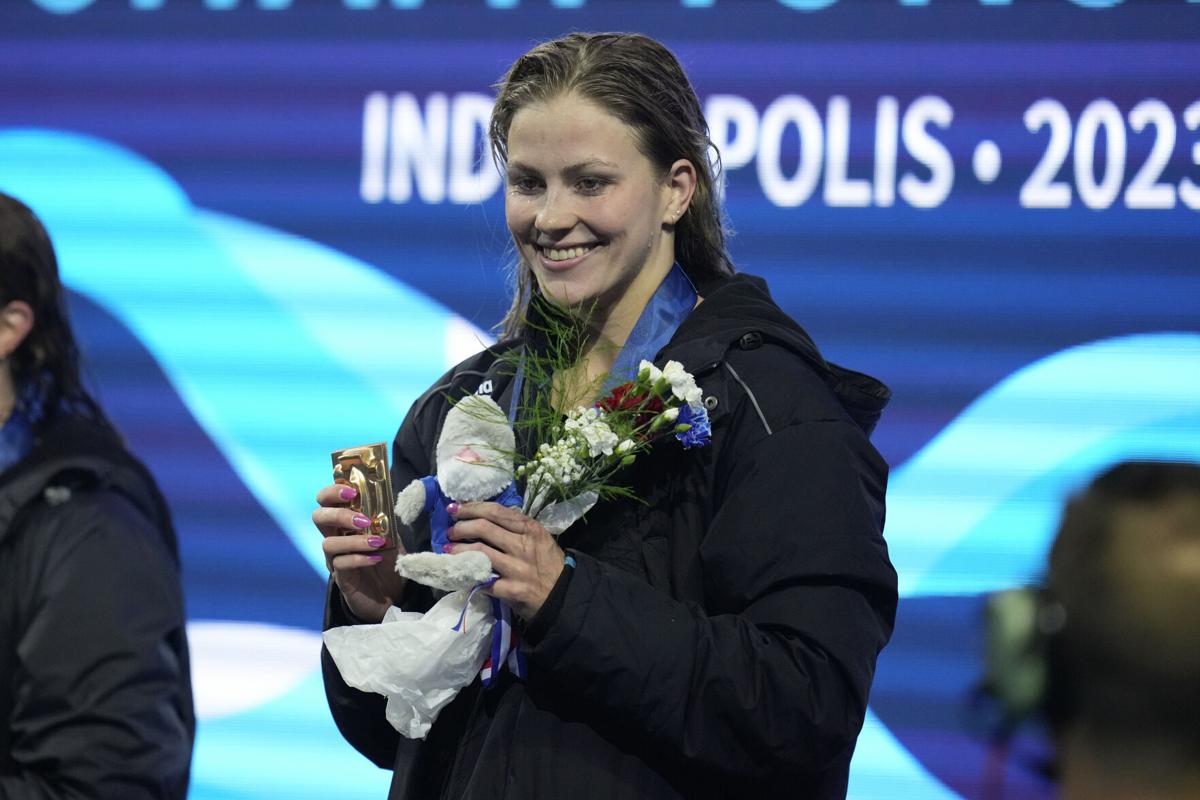 Katharine Berkoff wins third NCAA title in 100 backstroke