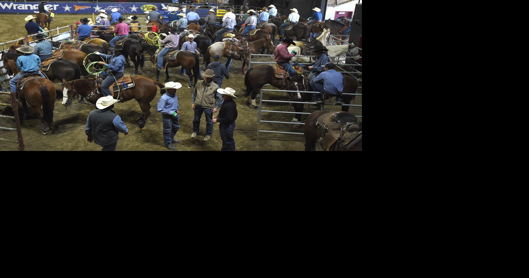 Team ropers compete in the Wrangler Roping Finals