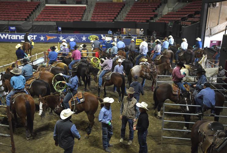 Team ropers compete in the Wrangler Roping Finals