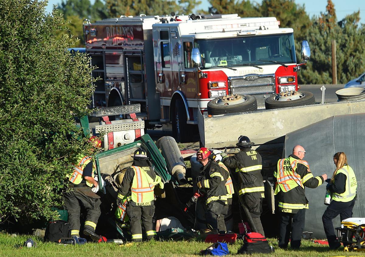 Photo: Driver extricated from crashed cement truck on I-90