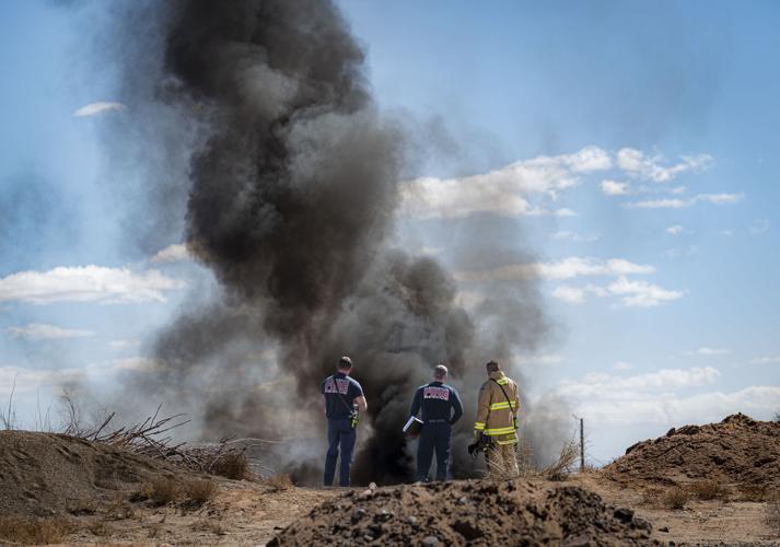 Tire fire off Bridge, near Coors, source of morning spectacle; no ...