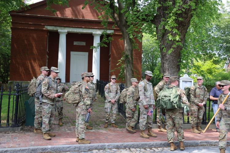 Soldiers "ruck march" through downtown to celebrate U.S. Army's 250th ...