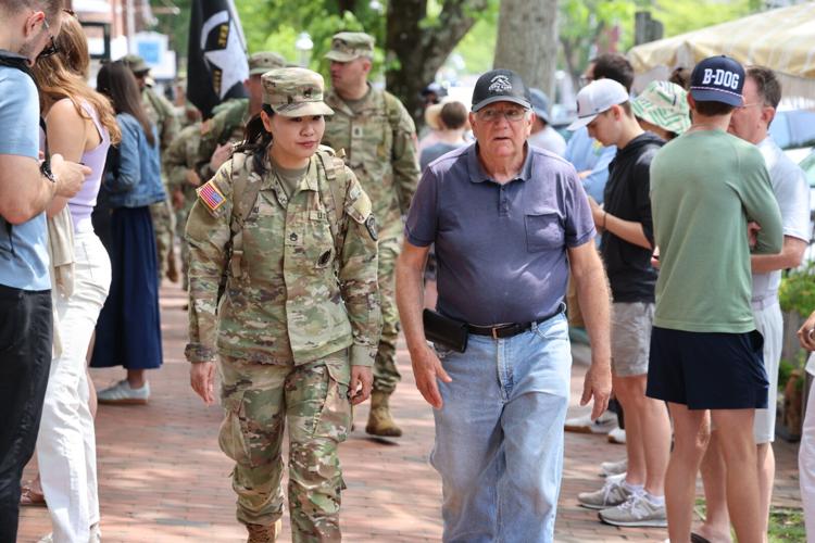 Soldiers "ruck march" through downtown to celebrate U.S. Army's 250th ...