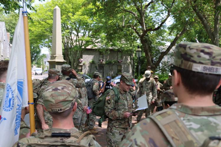 Soldiers "ruck march" through downtown to celebrate U.S. Army's 250th ...
