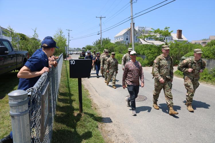 Soldiers "ruck march" through downtown to celebrate U.S. Army's 250th ...