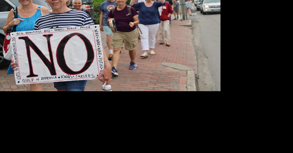 Protesters honor John Lewis, march against Trump in downtown ...