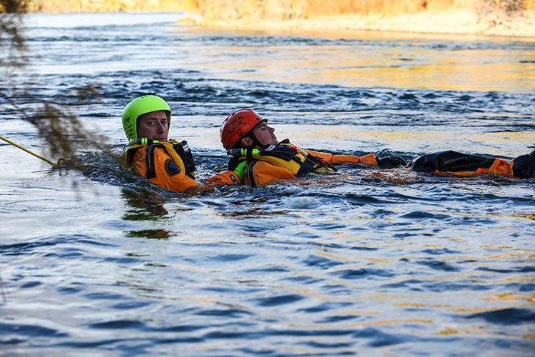 County firefighters jump in river to train for swiftwater rescues ...