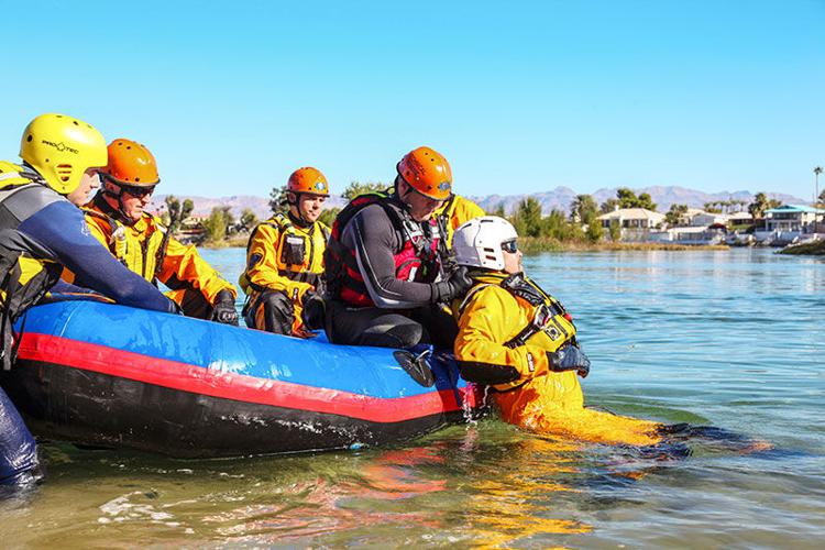 County firefighters jump in river to train for swiftwater rescues ...