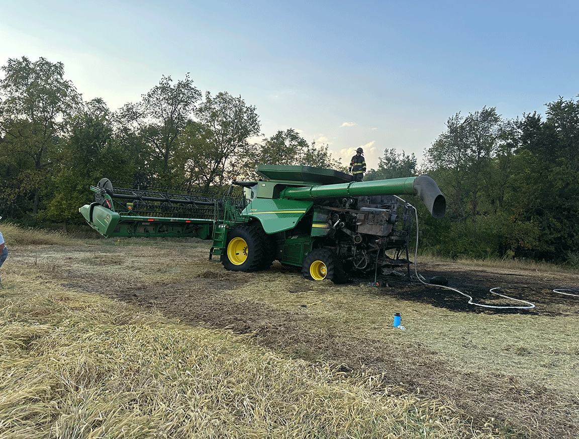 Illinois farmer escapes combine fire