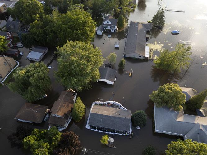 Rainfall causes evacuations, bridge collapses