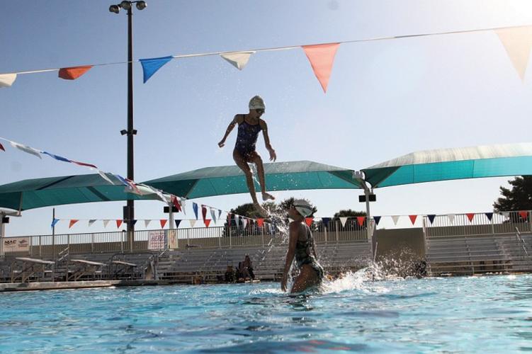 In Synch: Local girls to compete in synchronized swimming nationals ...
