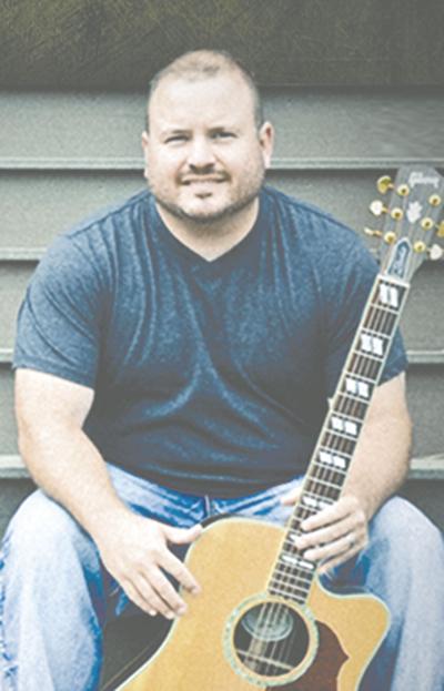 Brian Allen brings his acoustic guitar to the King Opera House stage ...