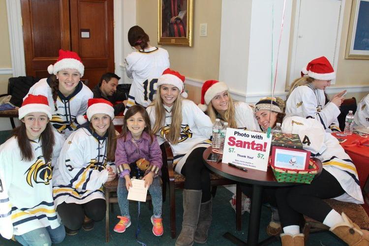 SCORE!...as AHS Girls' hockey team holds its popular Santa fundraiser ...