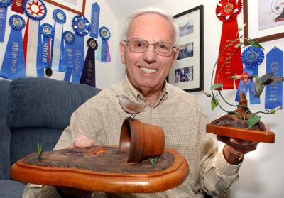 A world champ: Wood carving of childhood memory wins award for resident ...