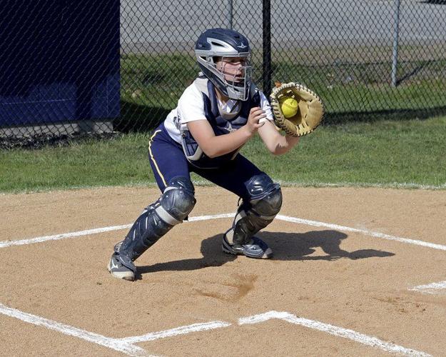 Following Harry; Roche finds shining example behind the plate in her ...