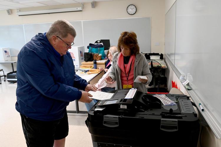 'We're waterproof': Merrimack Valley braves the rain to vote | Local ...