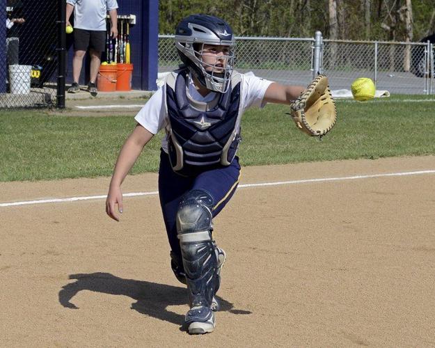 Following Harry; Roche finds shining example behind the plate in her ...