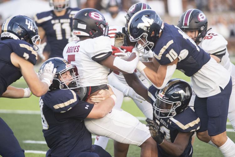 Moody quarterback Cole McCarty bounces back from interception to lead ...