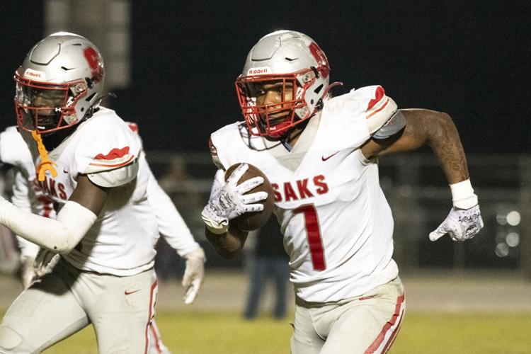 Photos: Childersburg defeats Saks 42-31 | Slideshows | annistonstar.com