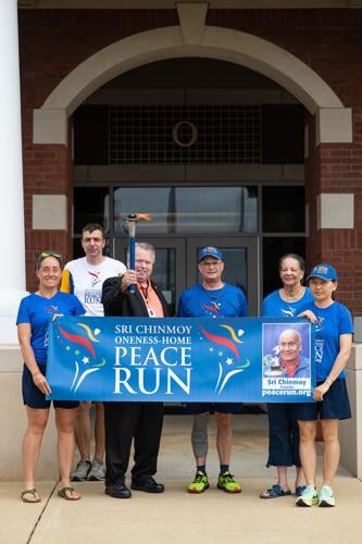 Oxford mayor passes peace torch | Free | annistonstar.com