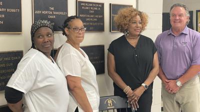 Chair dedication honors café staff for in-kind contributions | News ...