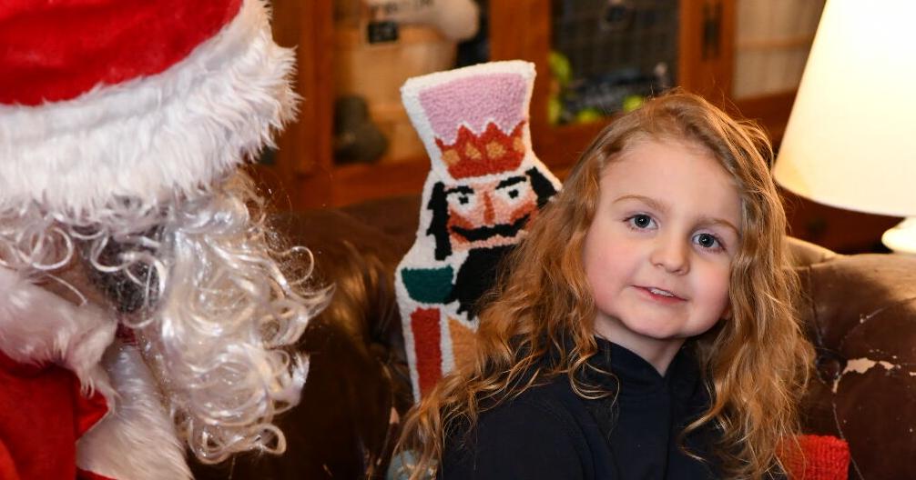 Downtown gift shop brings holiday cheer with Santa and the Grinch ...