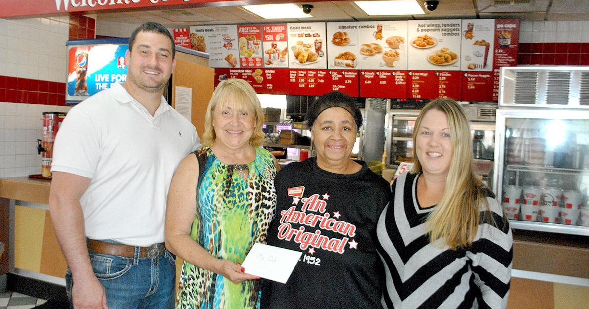 Her home is in the kitchen: KFC employee celebrates 20 years of service ...