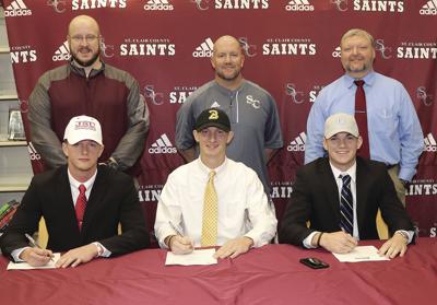 Three St. Clair County High football players sign college scholarships ...