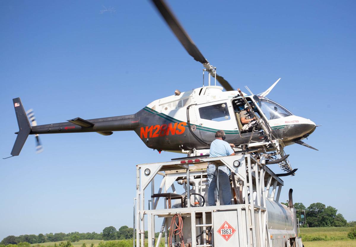 PHOTOS: Helicopter crop dusting | The Daily Home | annistonstar.com