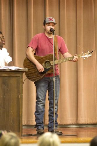 Singer/songwriter Ben Myrick performs at R.L. Young Elementary School ...