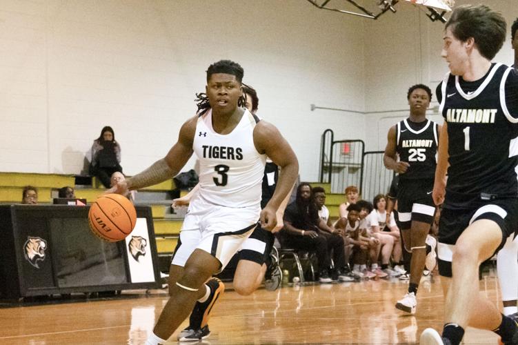 Photo gallery: B.B. Comer hosts Altamont, boys and girls basketball ...