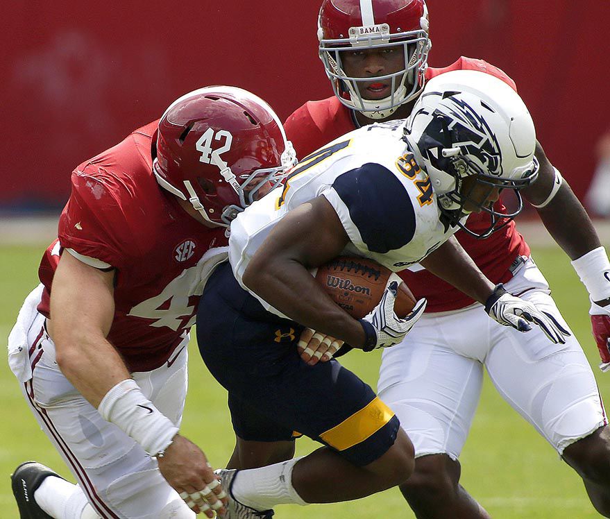 Alabama's Holcombe surprising people on the football field | Alabama ...