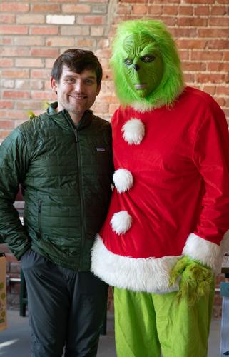 Downtown gift shop brings holiday cheer with Santa and the Grinch ...