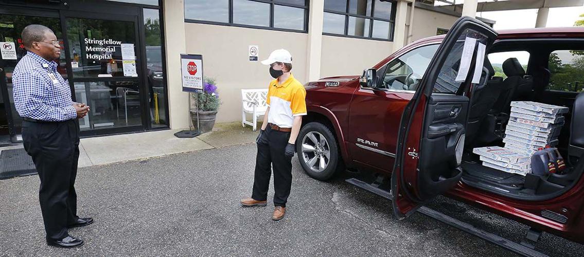 Weaver resident donates pizza to first responders, health care workers ...