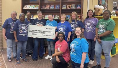 Friends of the Library present check for summer reading program | News ...