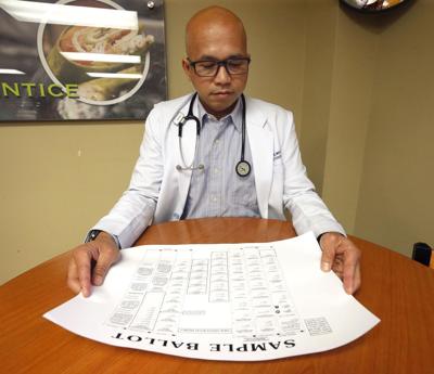 Local doctor casts first U.S. vote at age 50; urges others to cast a ...