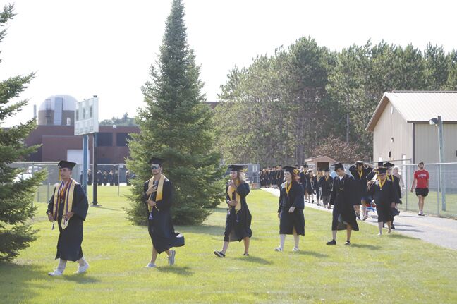 Grads ponder ‘unique year’ at belated Hayward High School commencement ...